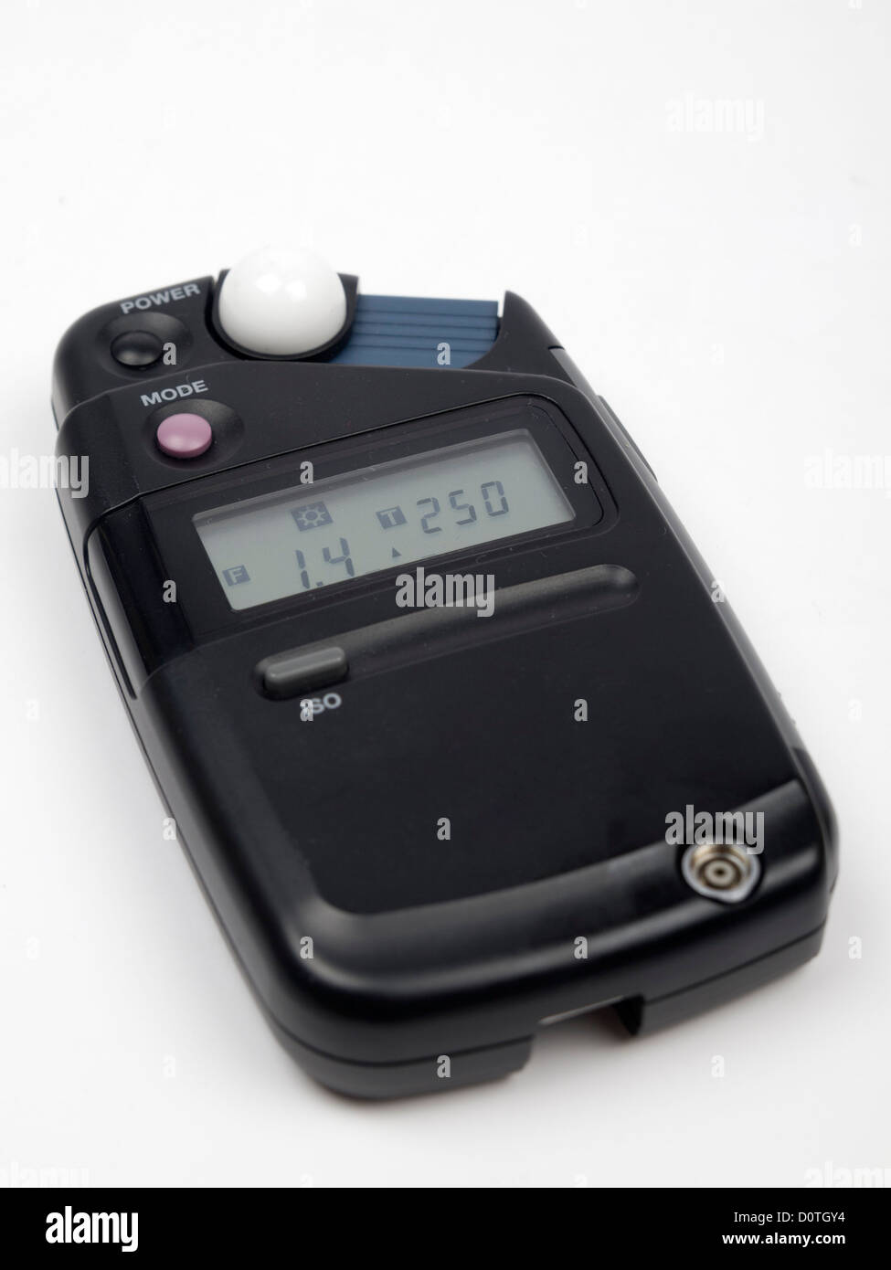 Photographic equipment light and flash meter isolated on white ...