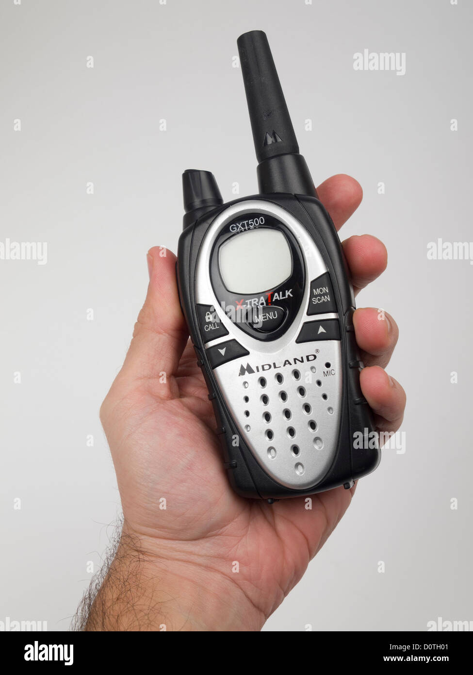 Hand holding midland walkie talkie hi-res stock photography and images ...