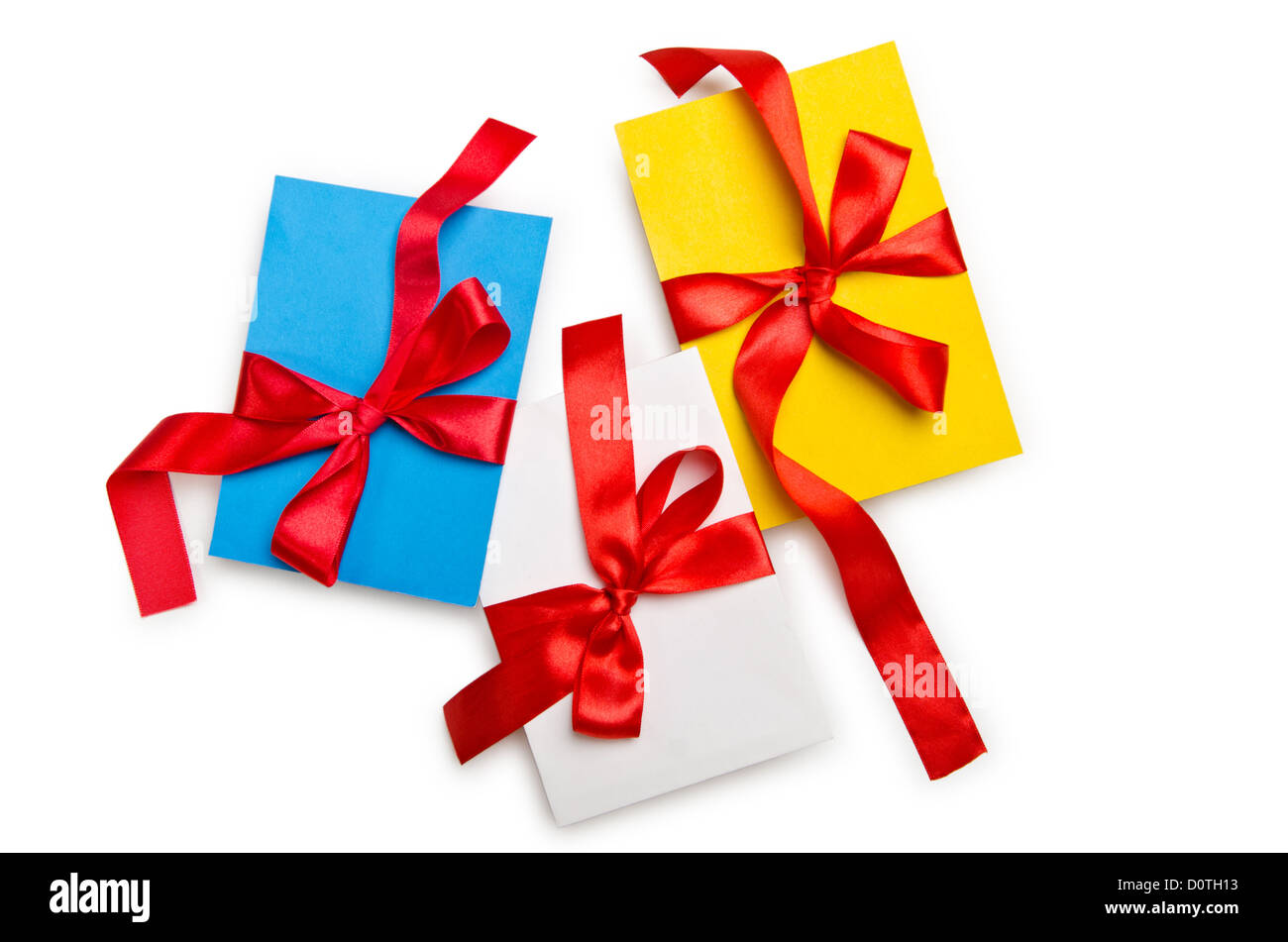 Envelope with colourful ribbon on white Stock Photo - Alamy