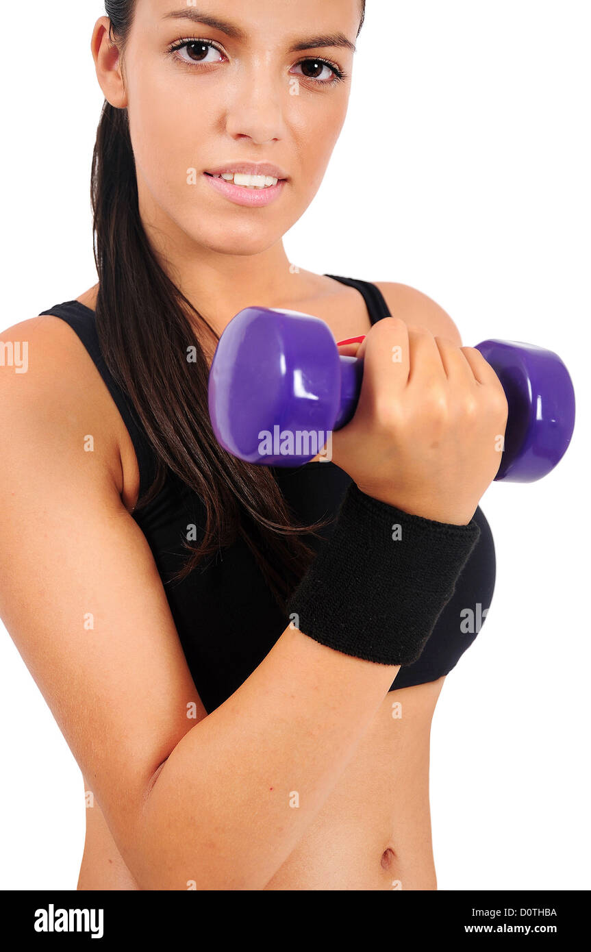 Isolated young fitness woman with dumbbell Stock Photo - Alamy
