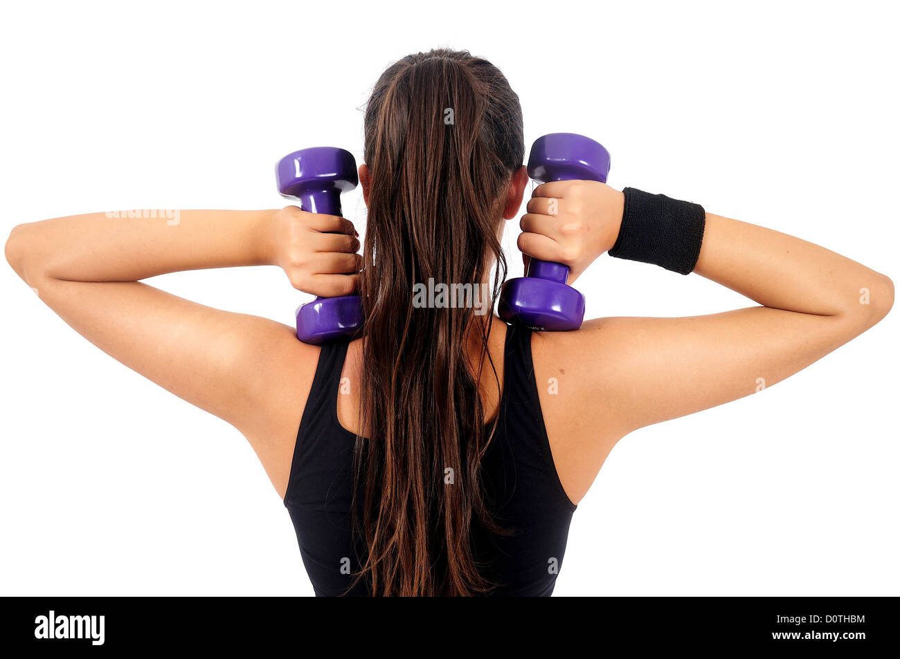 Isolated young fitness woman with dumbbell Stock Photo - Alamy
