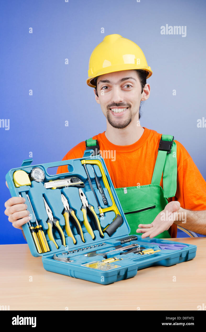Repairman with his toolkit Stock Photo - Alamy