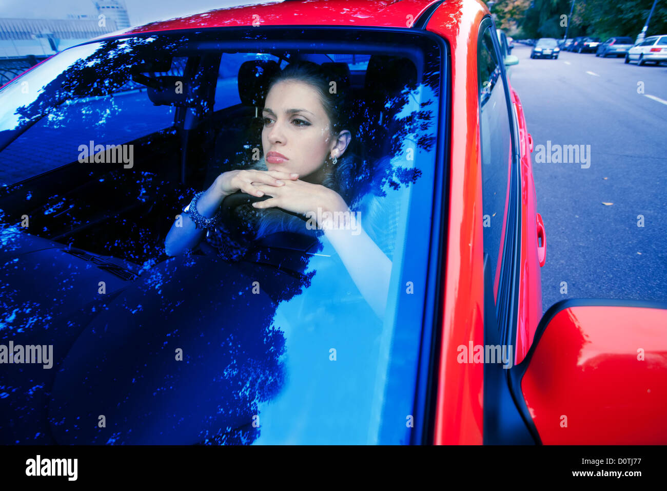 woman in red car Stock Photo - Alamy