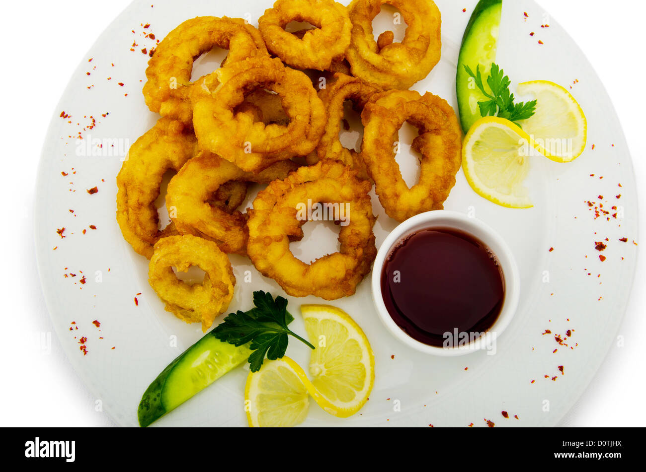Calamari rings in the plate Stock Photo - Alamy