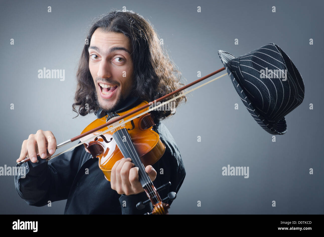 Fiddler playing the violin Stock Photo - Alamy