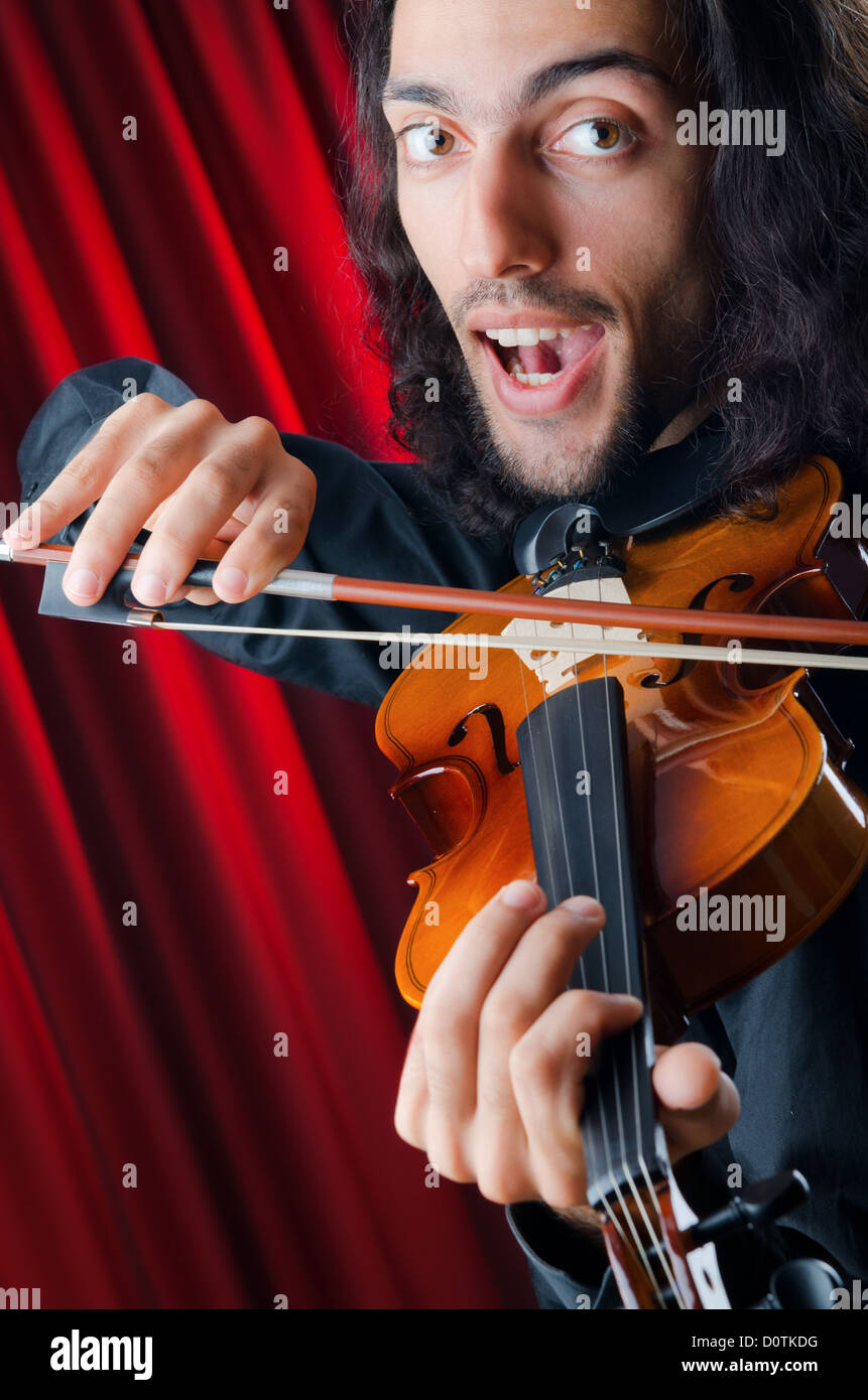 Violin player playing the intstrument Stock Photo - Alamy