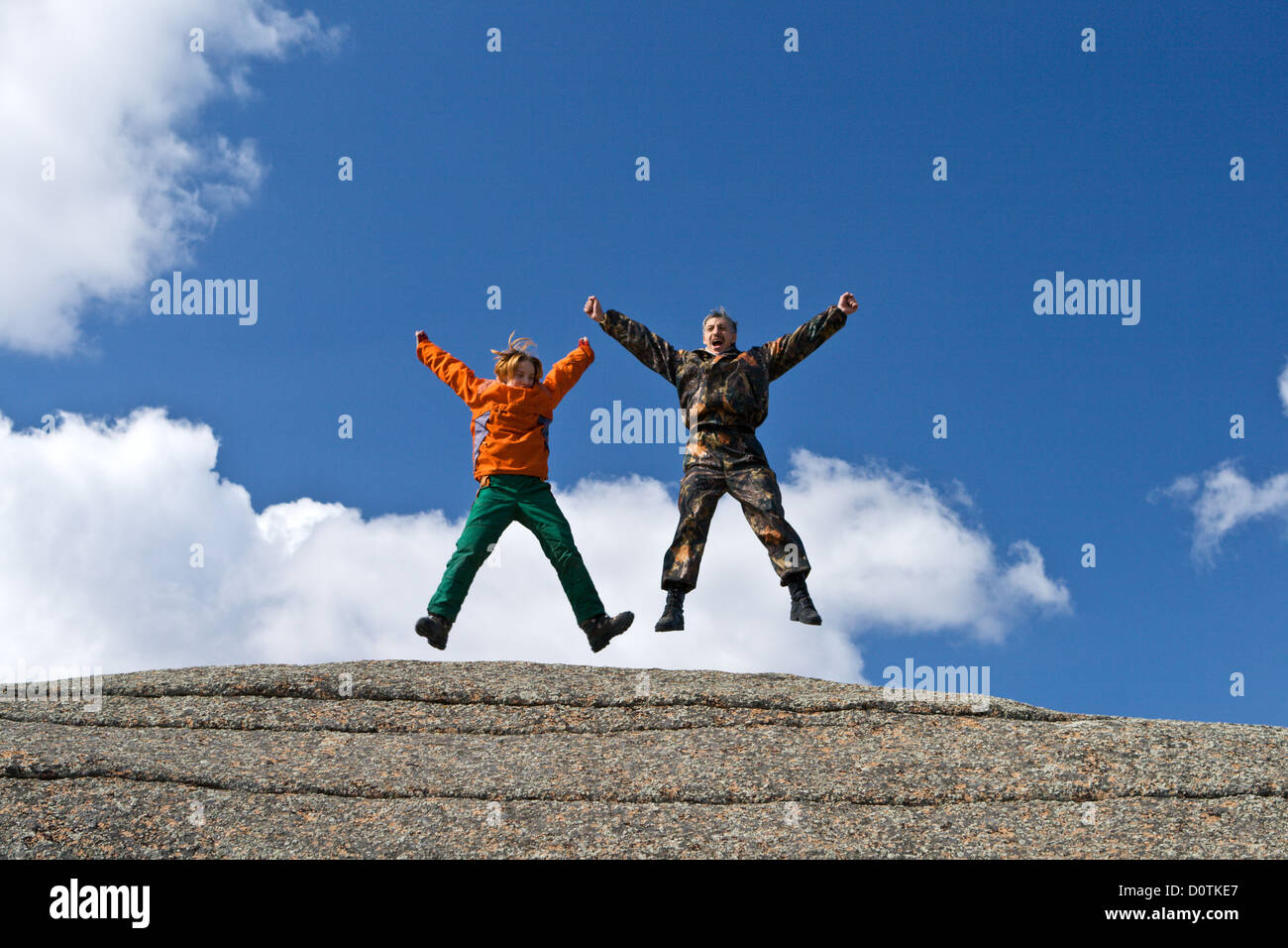Two people's high up in hill Stock Photo - Alamy