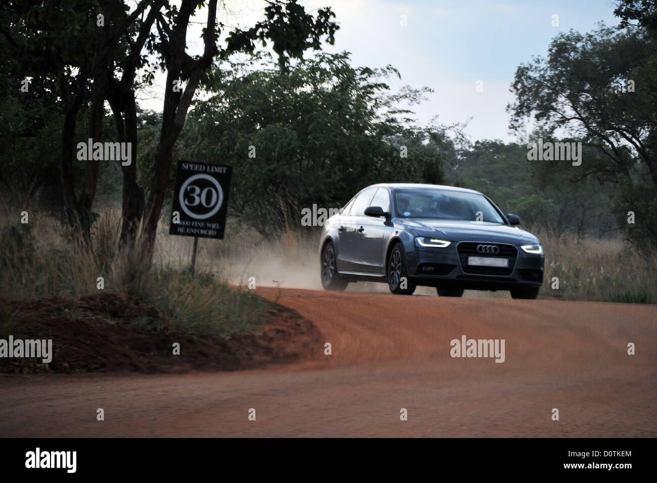 Driving car on dusty road hi-res stock photography and images - Alamy