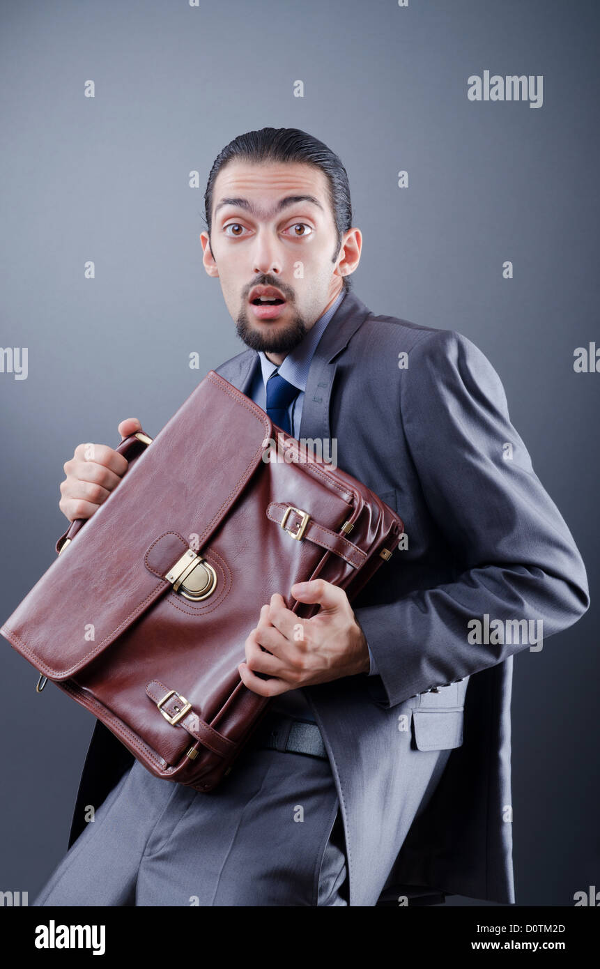 Business spy with briefcase Stock Photo - Alamy