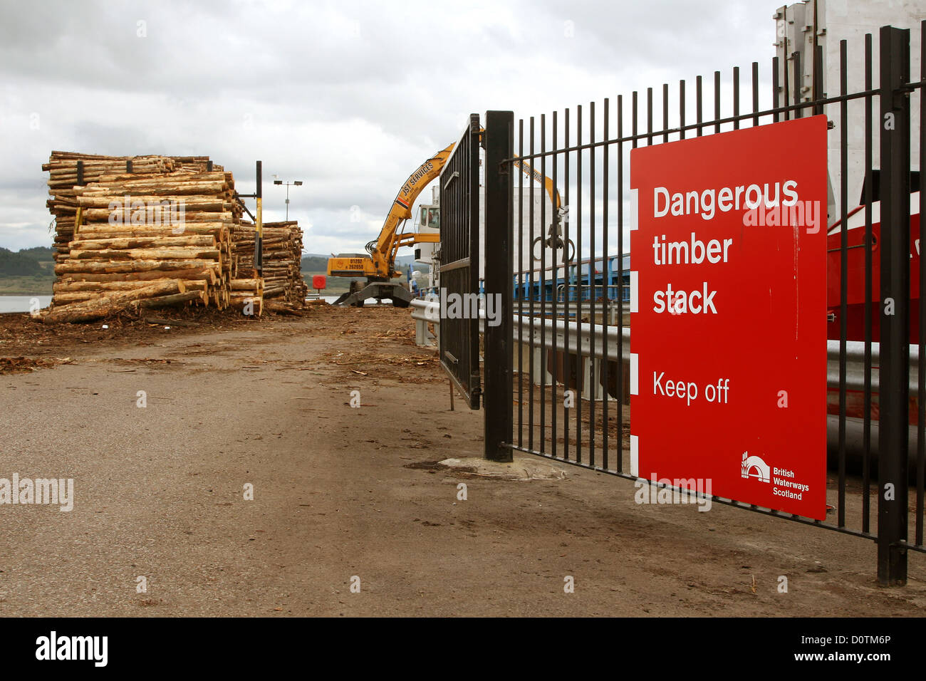 Dangerous timber stack in a yard ready for loading into a ship Stock ...