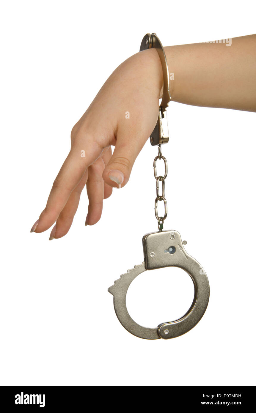 Handcuffed hands on white background Stock Photo - Alamy