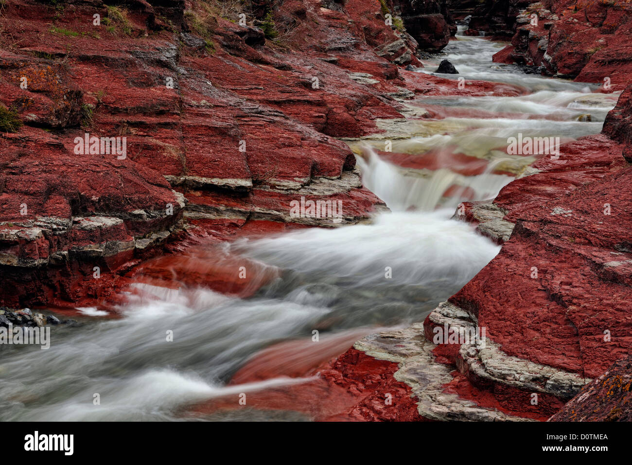 Red Rock Creek flowing through the eroded argillite sediments of Red ...