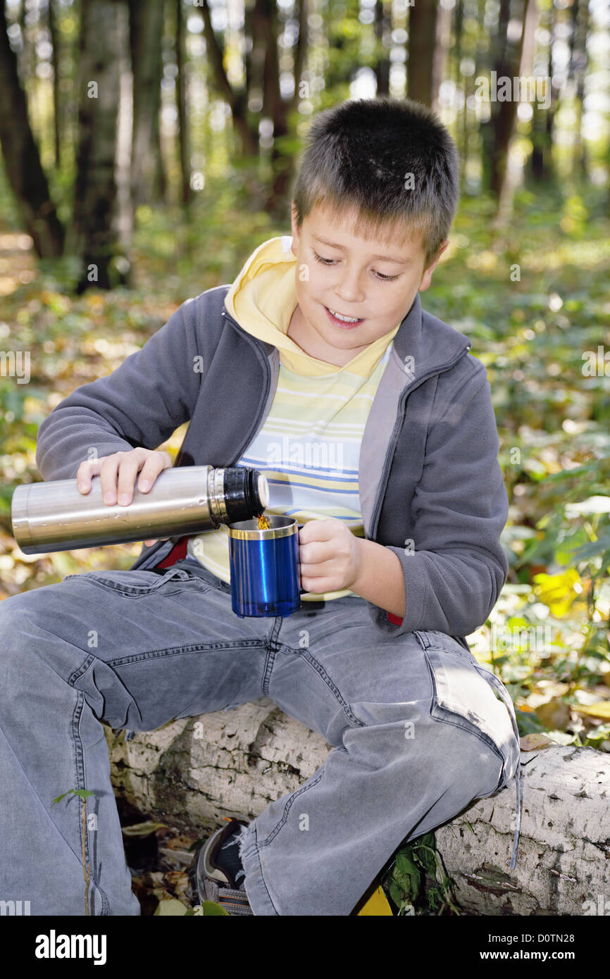 Boy with thermos hi-res stock photography and images - Alamy
