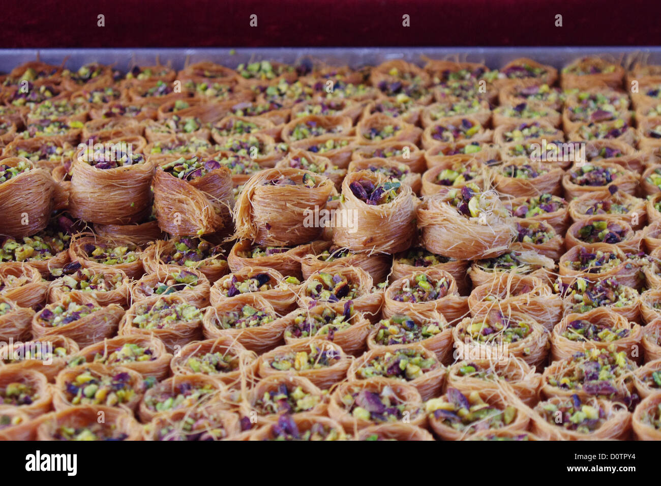 Arab baklava nut sweets. food market Akko Israel Stock Photo - Alamy