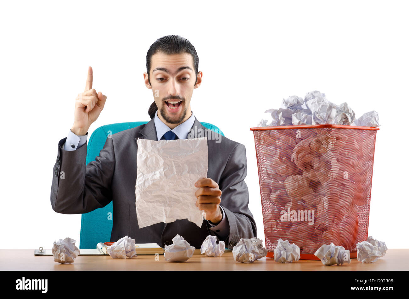 Man with lots of wasted paper Stock Photo - Alamy