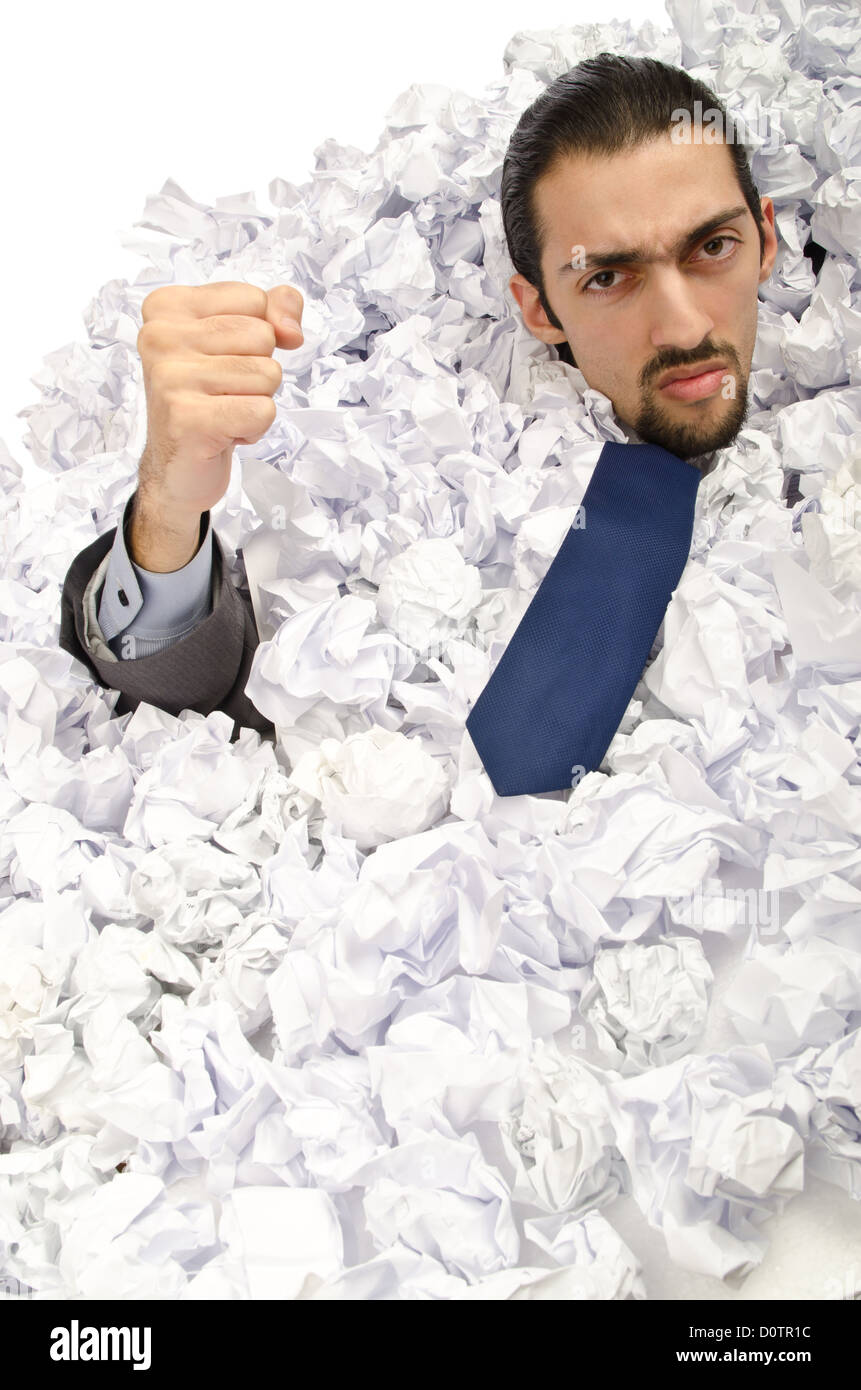 Man with lots of crumpled paper Stock Photo - Alamy