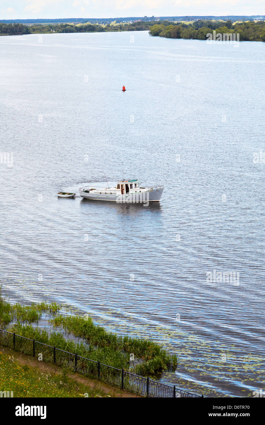 River launch with a boat in the afternoon Stock Photo - Alamy