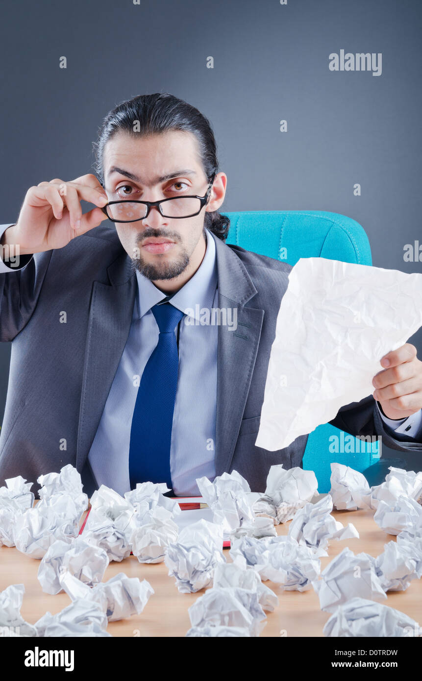 Businessman throwing paper away Stock Photo - Alamy
