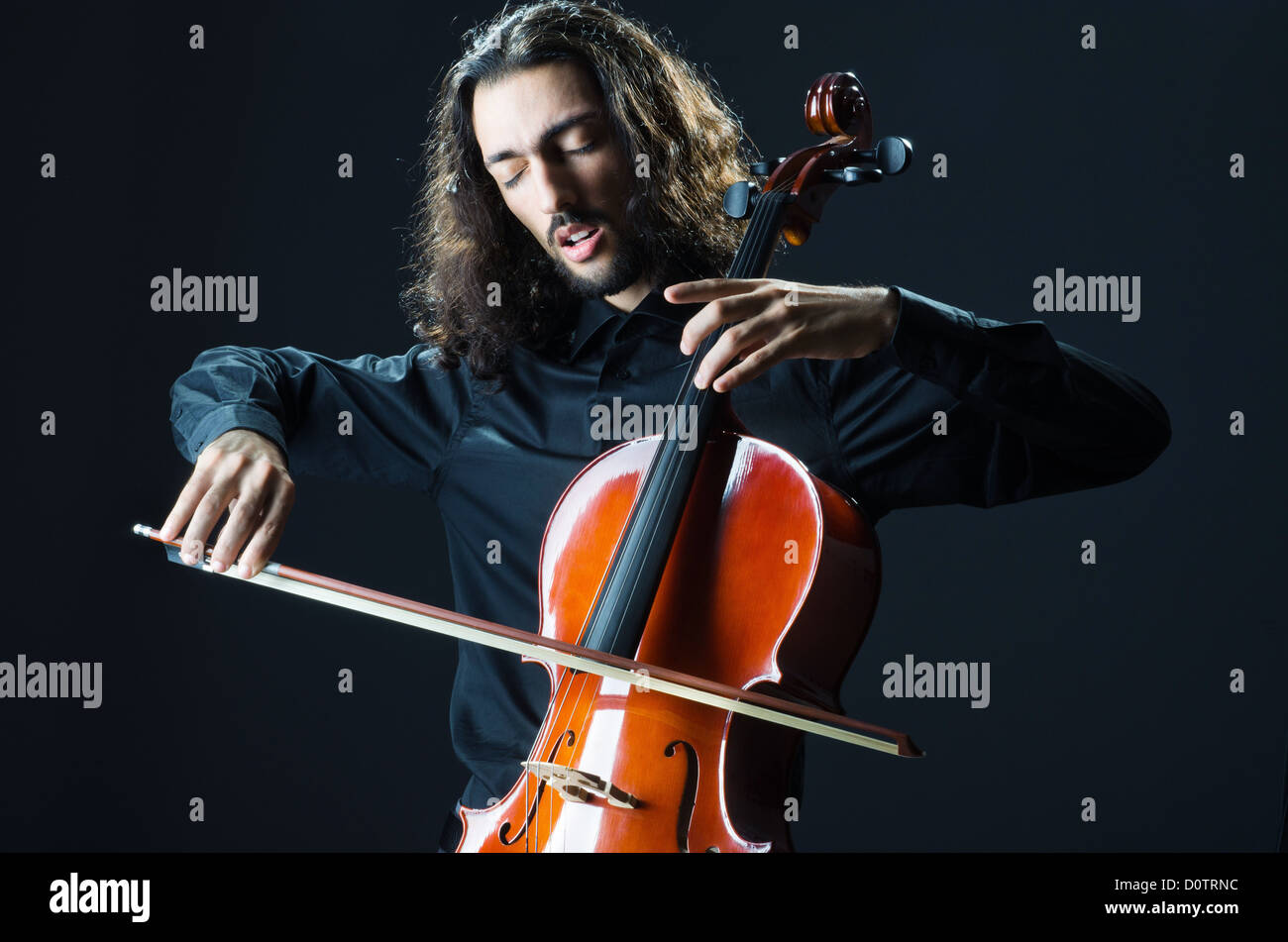 Man playing the cello Stock Photo - Alamy