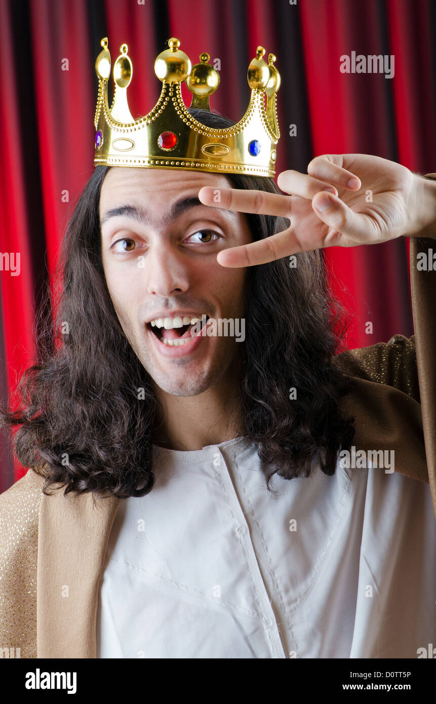 King with crown against background Stock Photo - Alamy