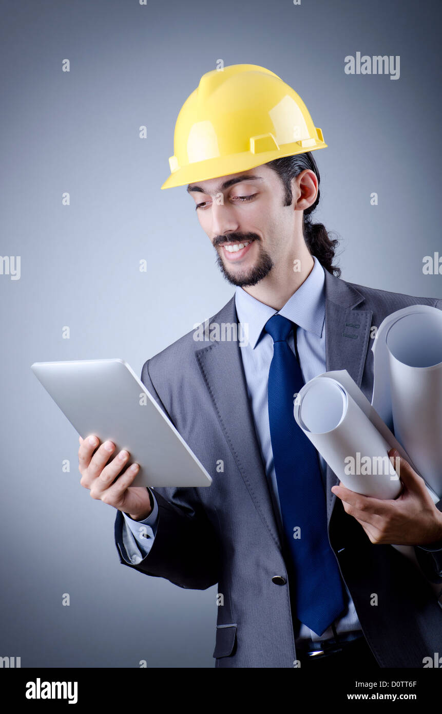 Construction worker working on tablet Stock Photo - Alamy