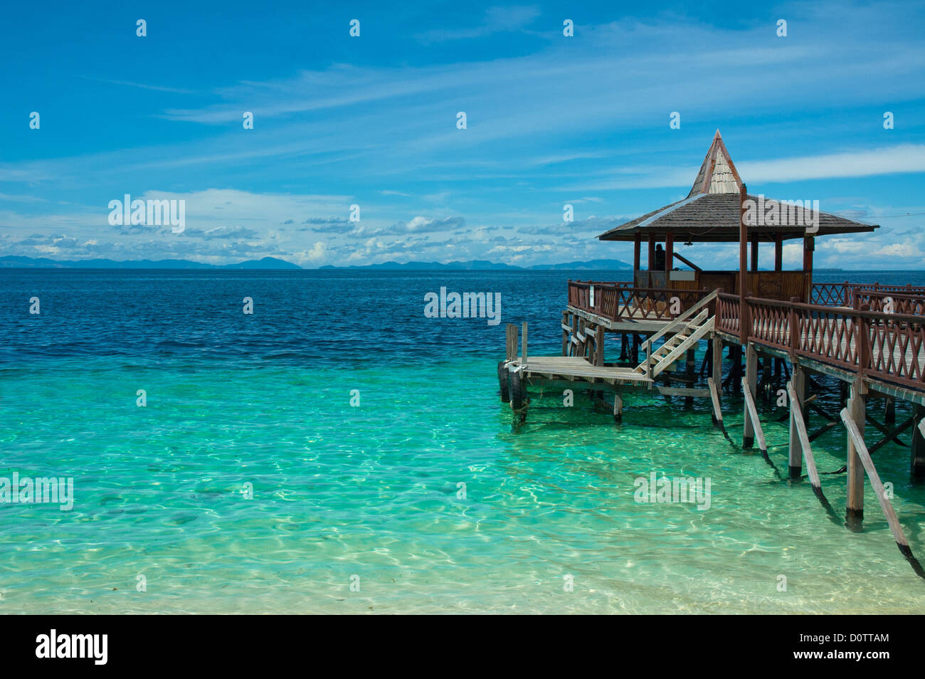 Pier at tropical island Stock Photo - Alamy