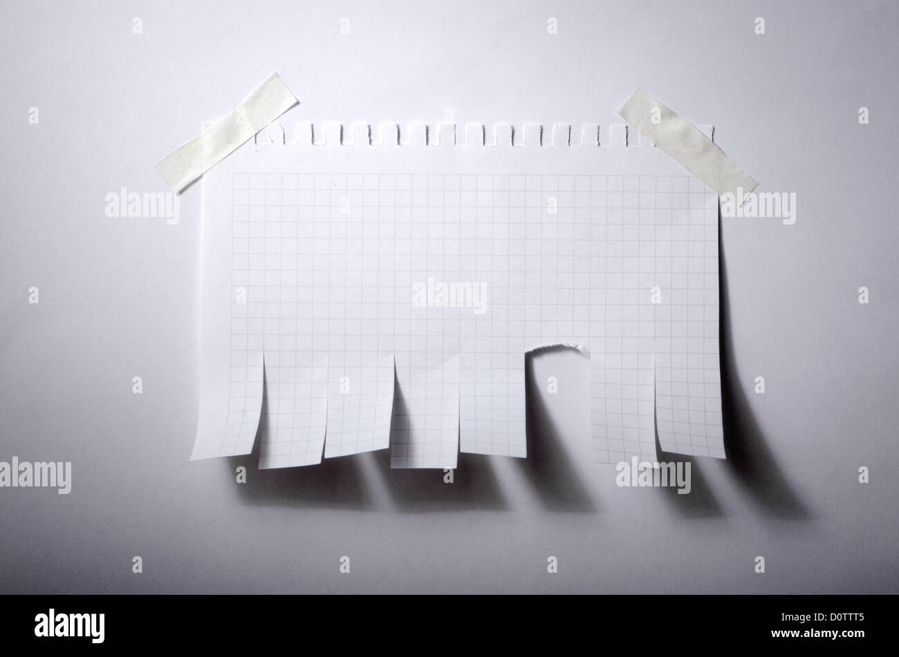 Tear off paper notice on the wall Stock Photo - Alamy