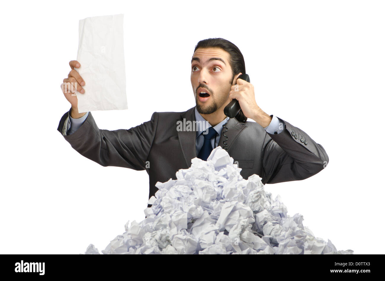 Man with lots of crumpled paper Stock Photo - Alamy