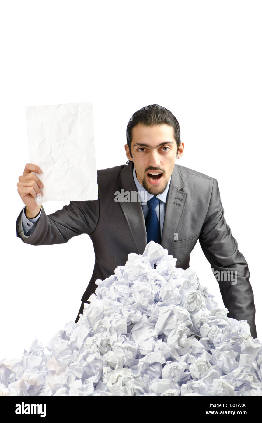 Man with lots of crumpled paper Stock Photo - Alamy