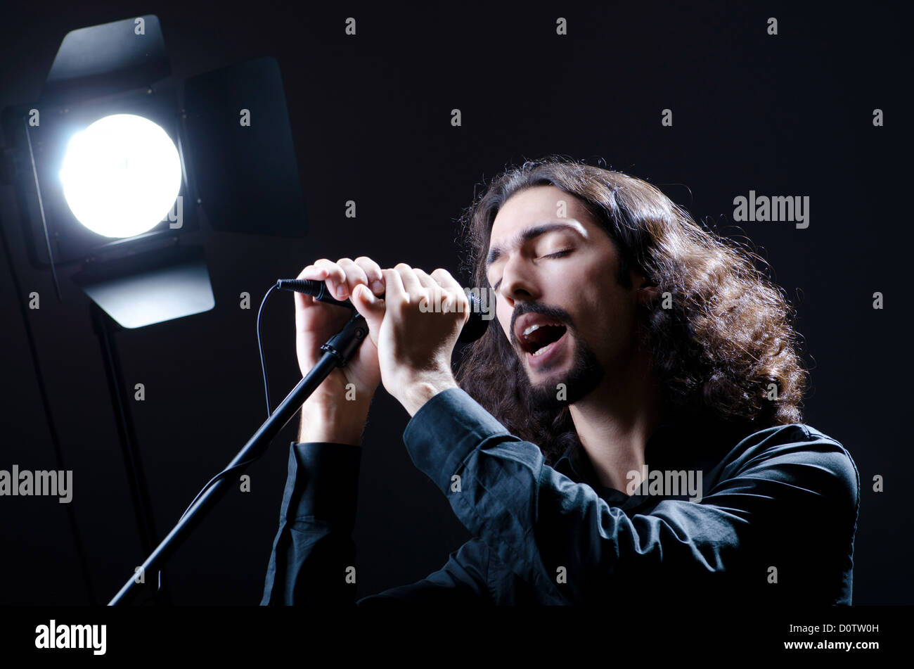 Man singing at the concert Stock Photo - Alamy
