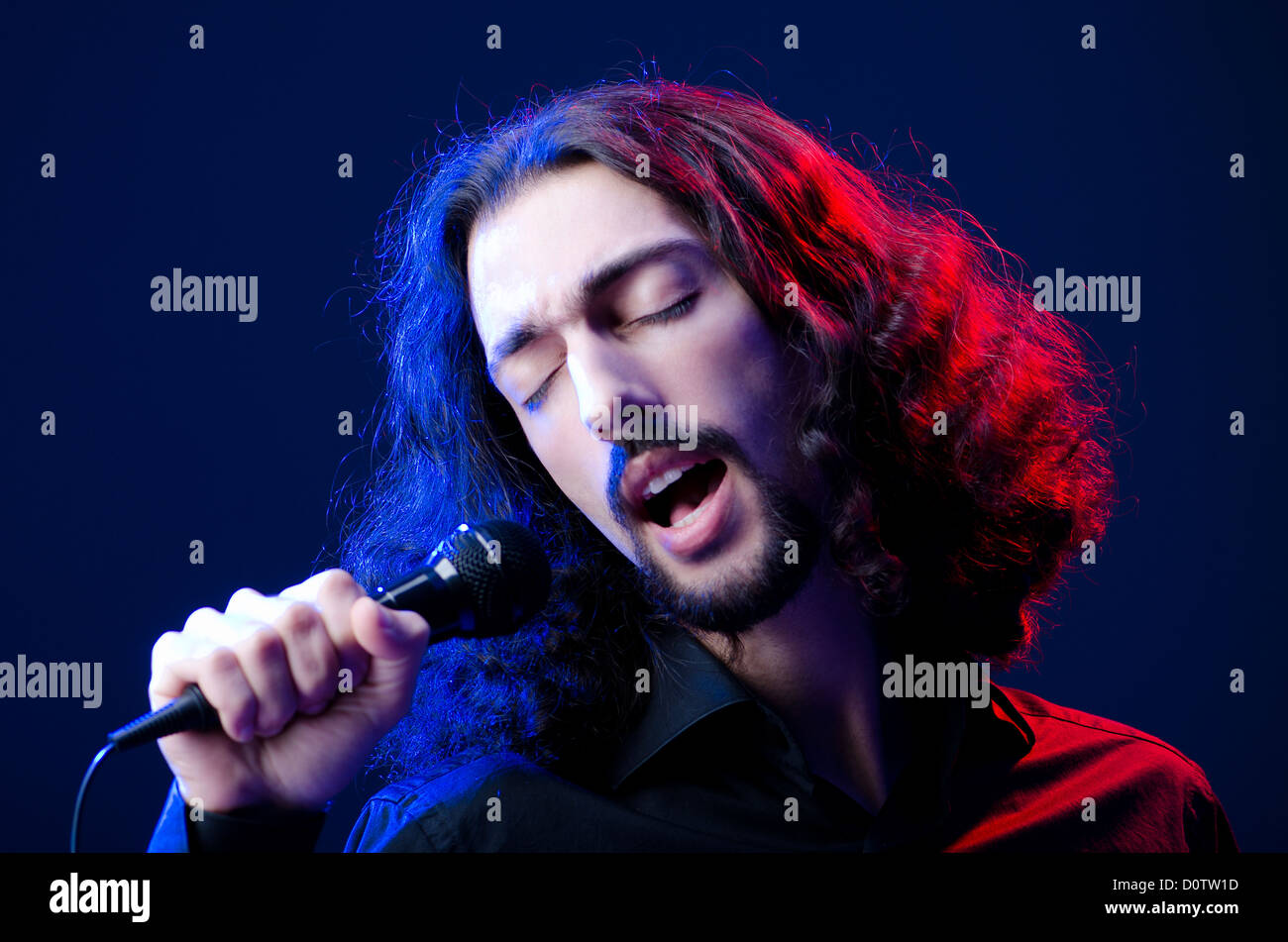 Man singing at the concert Stock Photo - Alamy