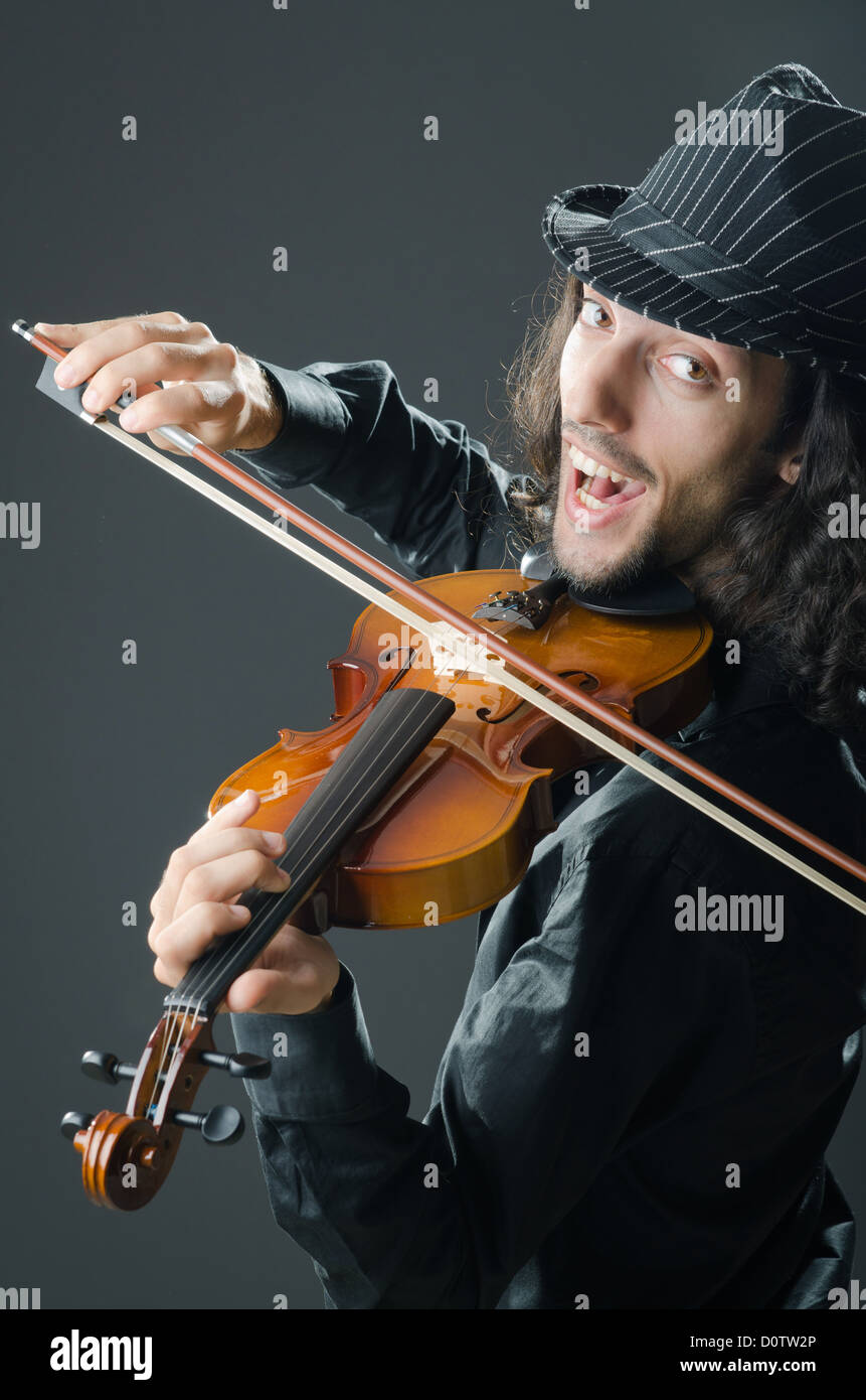 Fiddler playing the violin Stock Photo - Alamy