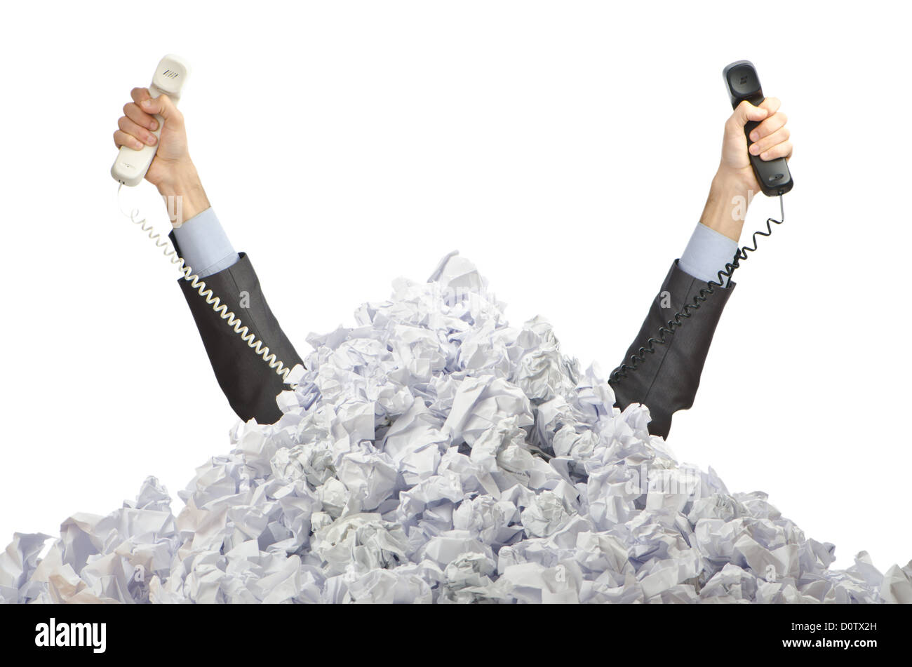 Man with lots of crumpled paper Stock Photo - Alamy