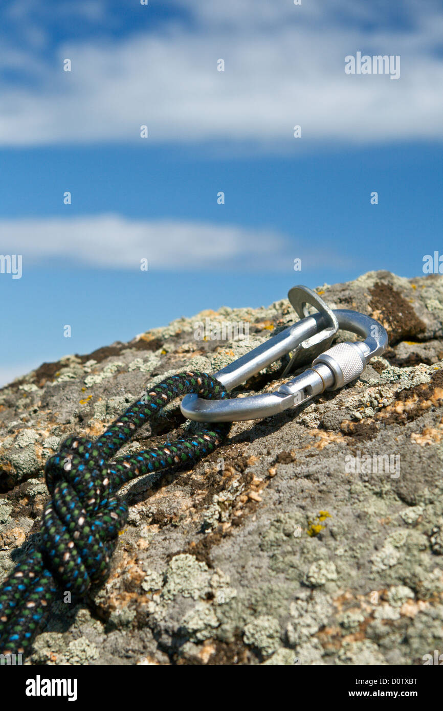 Carbine and rope on rock Stock Photo - Alamy