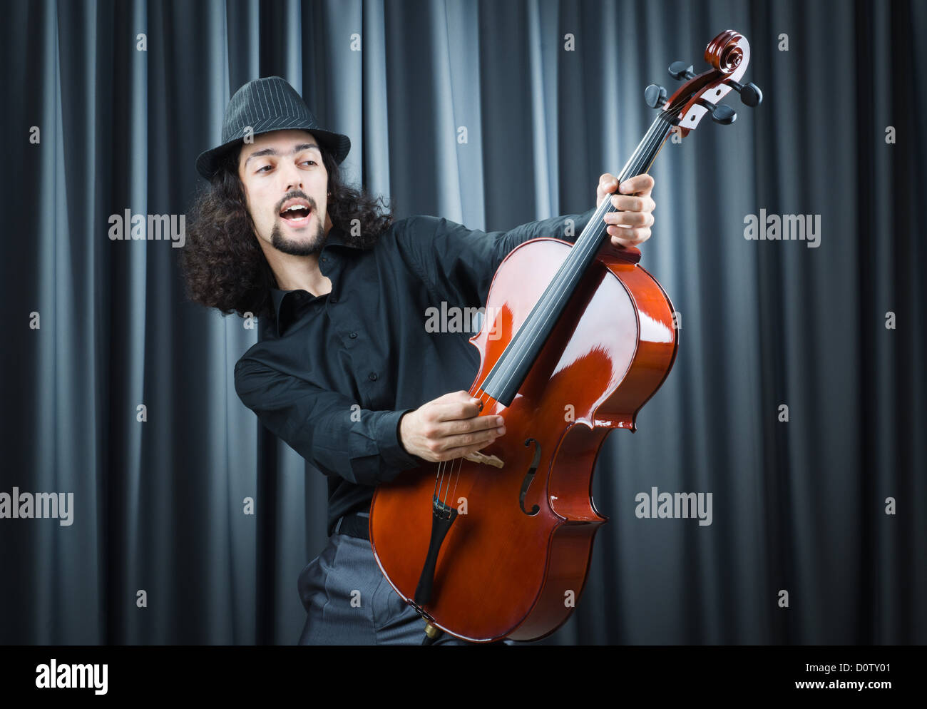Man playing the cello Stock Photo - Alamy