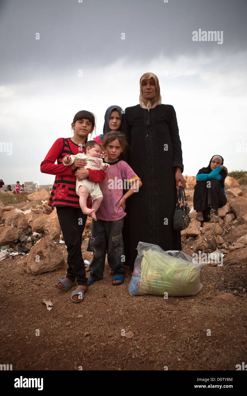 02/10/12, atmah refugee camp, Atmah, Syria. A Syrian mother poses with ...
