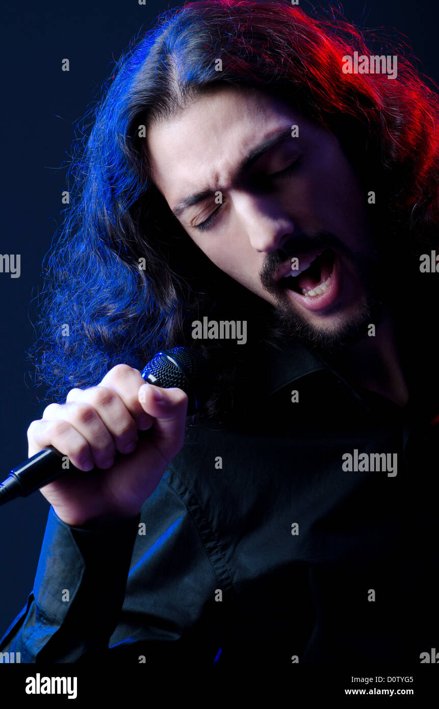 Man singing at the concert Stock Photo - Alamy