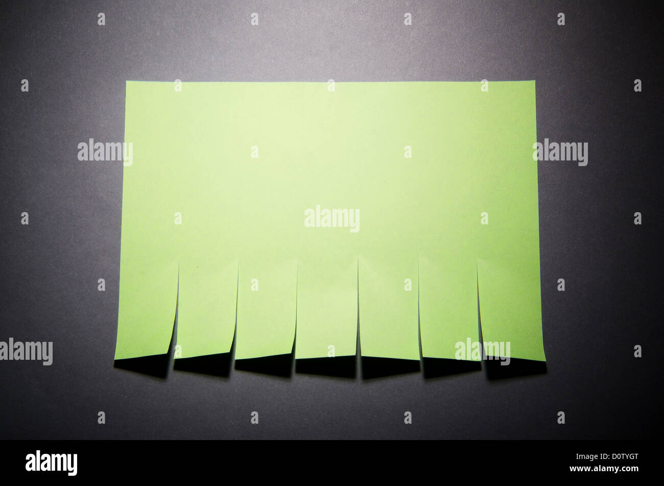 Tear off paper notice on the wall Stock Photo - Alamy