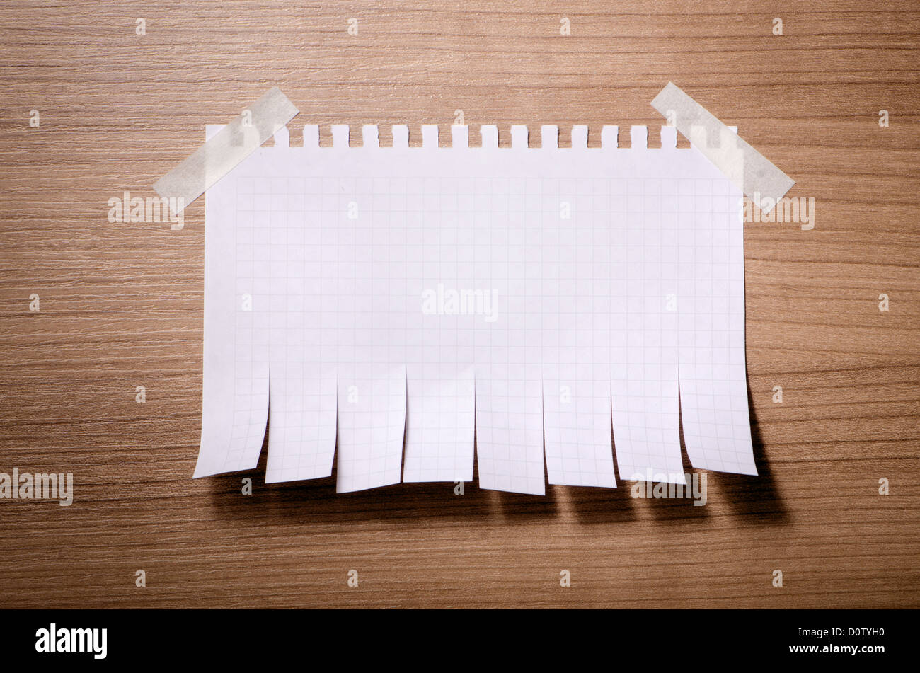 Tear off paper notice on the wall Stock Photo - Alamy