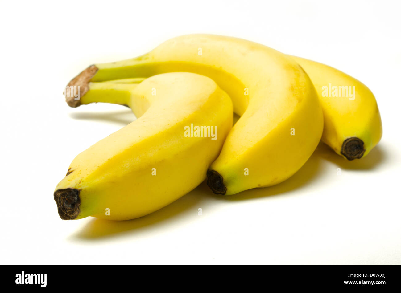 A bunch of 3 Bananas on isolated white background Stock Photo - Alamy