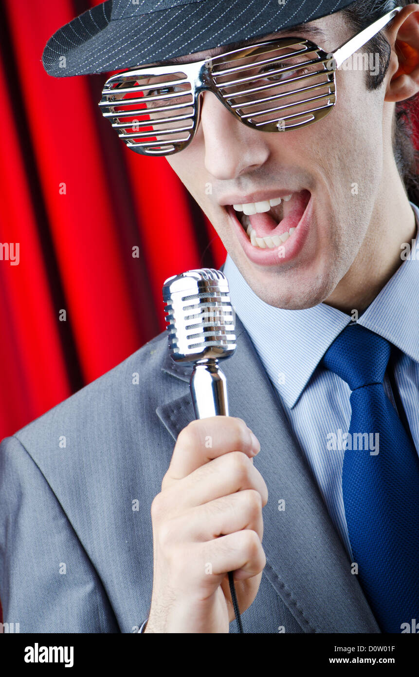 Man performing at the concert Stock Photo - Alamy