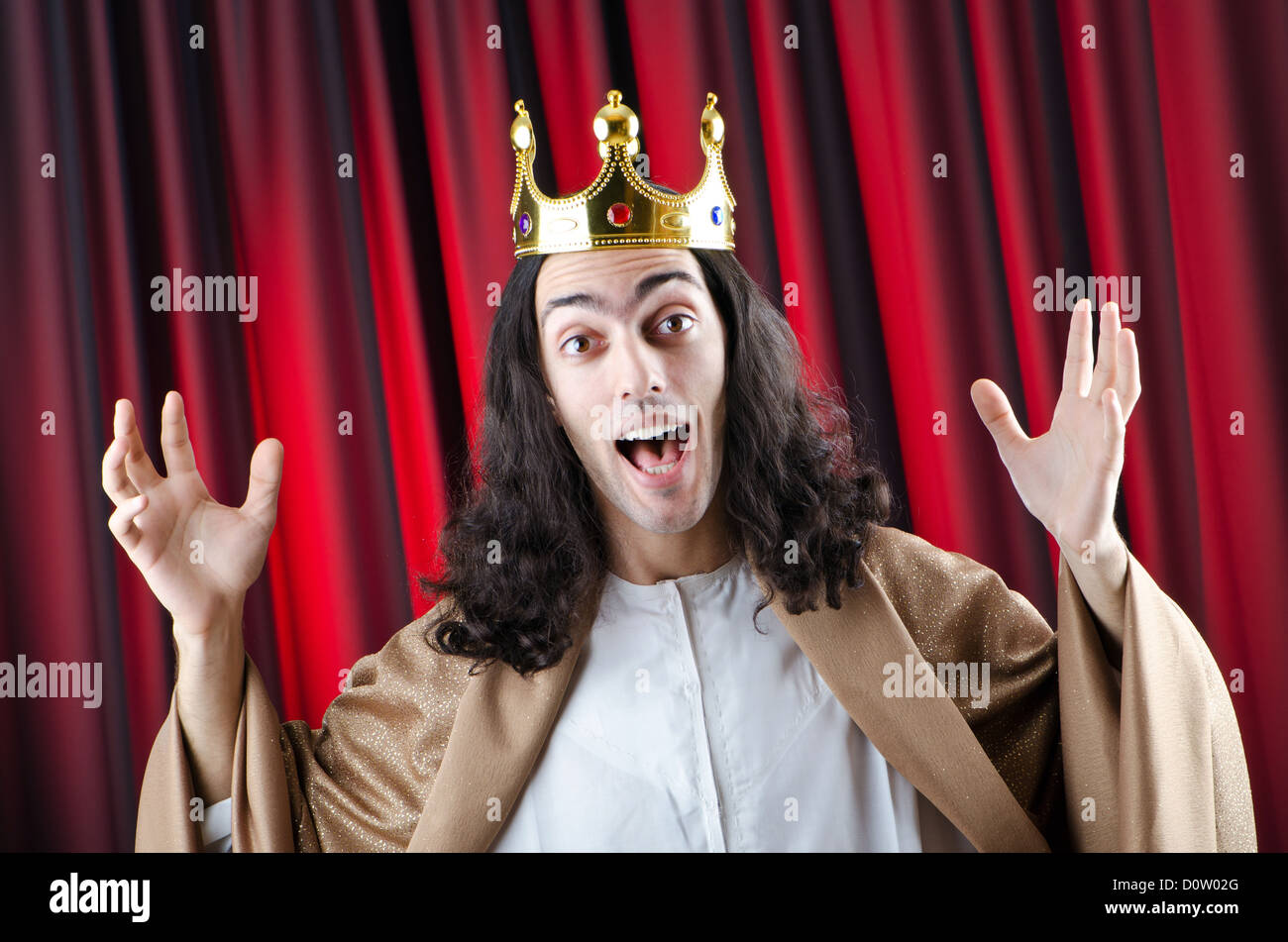 King with crown against background Stock Photo - Alamy