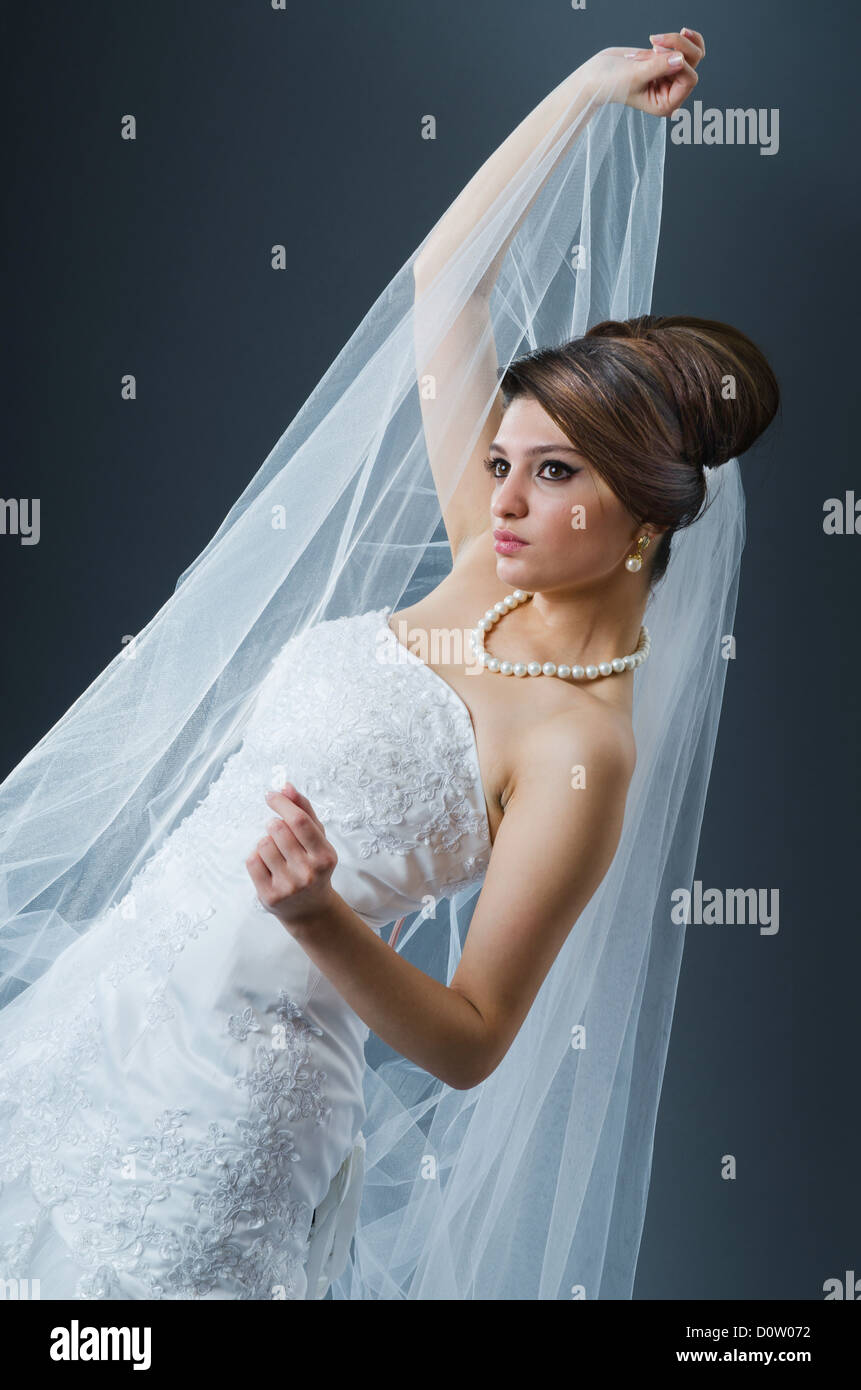 Beautiful bride in studio shooting Stock Photo - Alamy