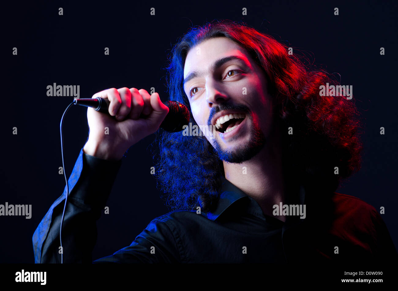 Man singing at the concert Stock Photo - Alamy