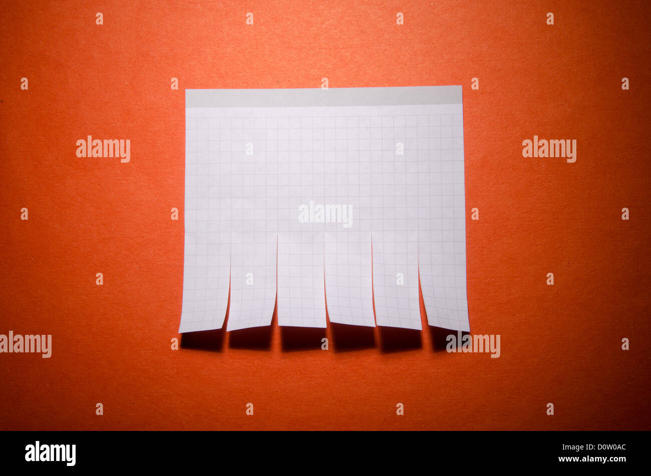 Tear off paper notice on the wall Stock Photo - Alamy
