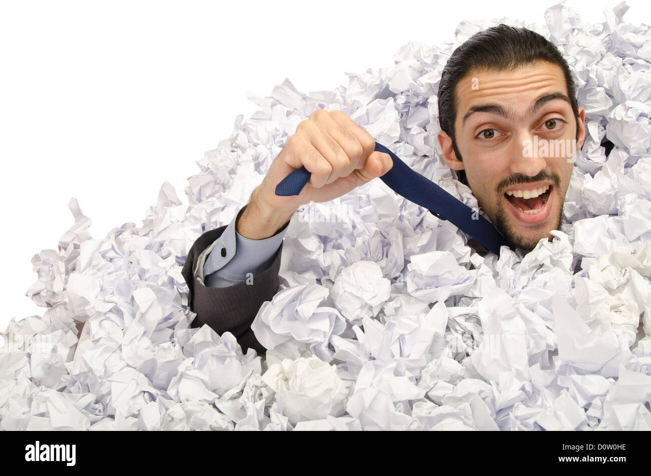 Man with lots of crumpled paper Stock Photo - Alamy