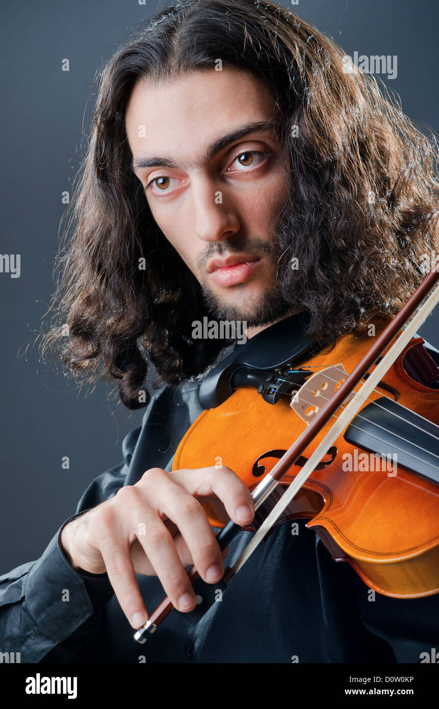 Violin player playing the intstrument Stock Photo - Alamy