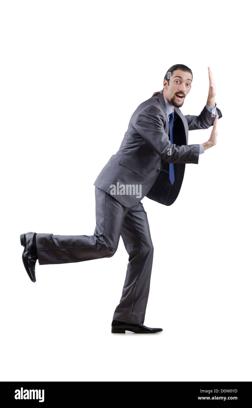 Businessman pushing away virtual obstacles Stock Photo - Alamy