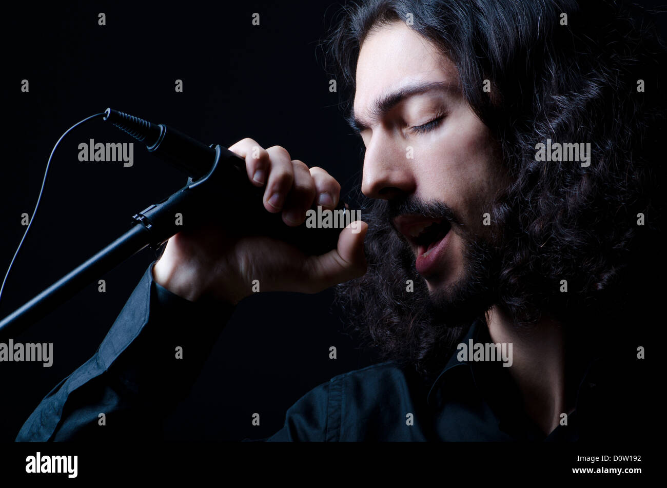 Man singing at the concert Stock Photo - Alamy