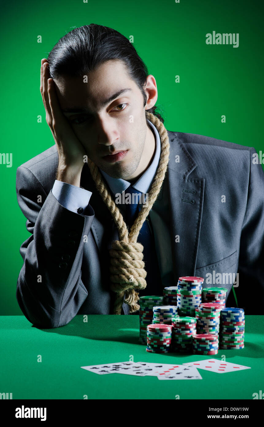 Man playing in the casino Stock Photo - Alamy